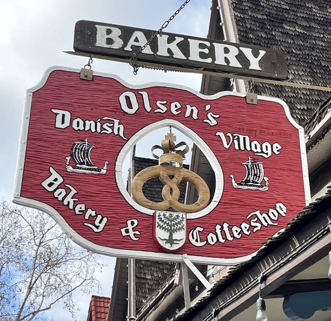The iconic red sign with its pretzel emblem has guided hungry travelers to buttery bliss for generations – a beacon of baked goodness.