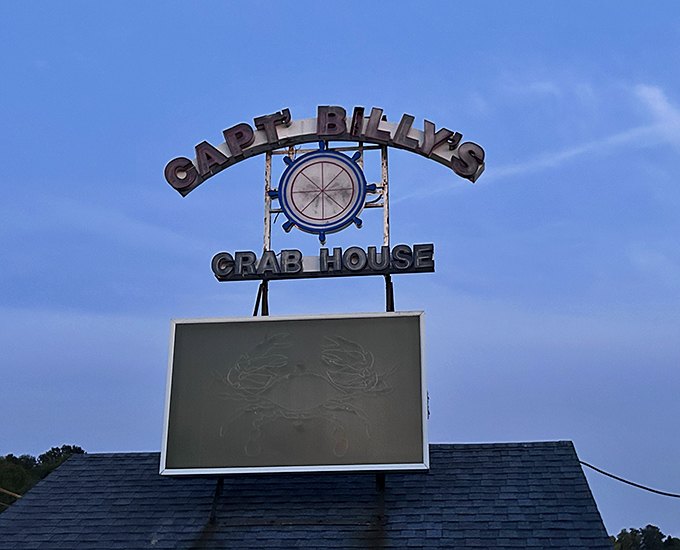 The sign that's guided generations of crab enthusiasts – less a logo, more a family crest for Maryland seafood royalty.