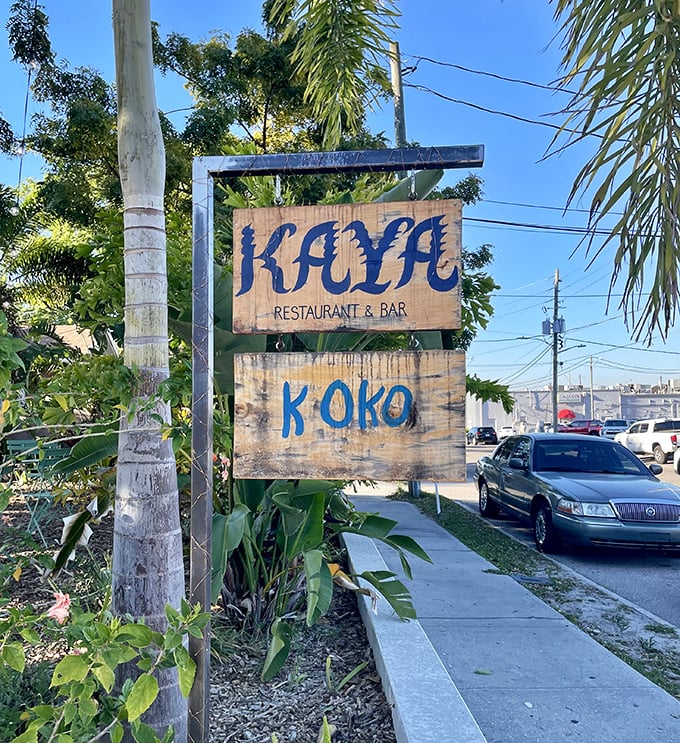 "The wooden sign stands like a beacon for flavor-seekers. 'KAYA' isn't just a name – it's your new answer to 'Where should we eat tonight?'"