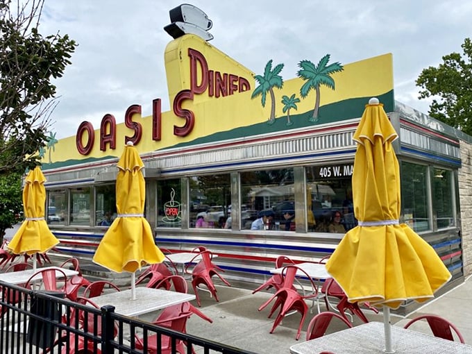 The palm trees on that iconic yellow sign might be aspirational for Indiana, but they promise the kind of escape that good comfort food delivers.