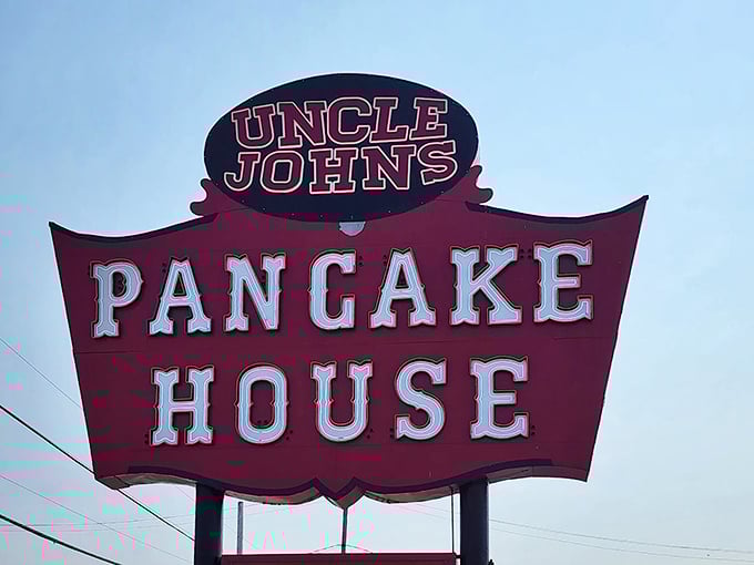 The iconic sign stands against the sky like a red-and-white promise – here, beneath this banner, pancake dreams come true.