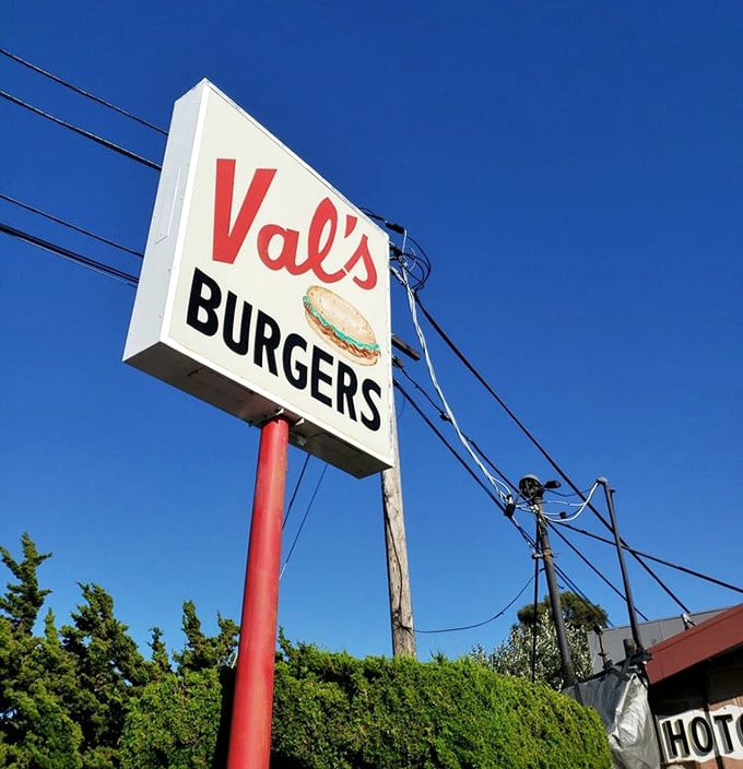 The sign that's guided hungry travelers for generations. Against that perfect blue California sky, it's not just advertising—it's a landmark.