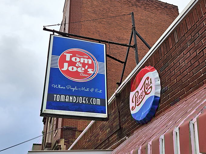 That Pepsi sign has witnessed more local gossip than any therapist in town—a silent sentinel to decades of Altoona's daily dramas.