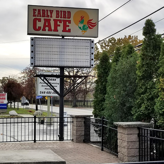The iconic sign standing tall – a beacon of breakfast hope for hungry travelers and locals alike on Michigan mornings.