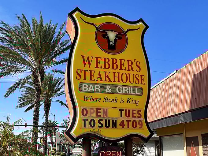 The sign that started a thousand cravings – simple, straightforward, and hiding absolute culinary magic inside.