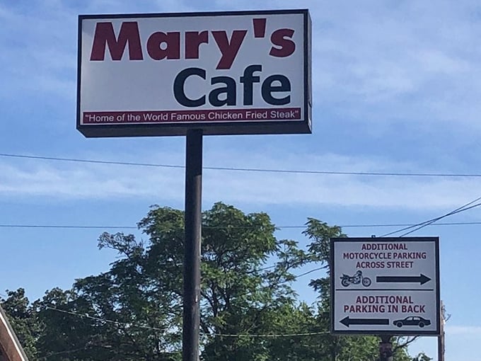 The sign says it all – "Home of the World Famous Chicken Fried Steak" isn't just marketing; it's a promise that Mary's Cafe delivers on with every single plate.