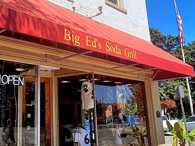 That sign says everything you need to know—this isn't just a restaurant, it's a landmark. The red awning is basically a welcome mat. 