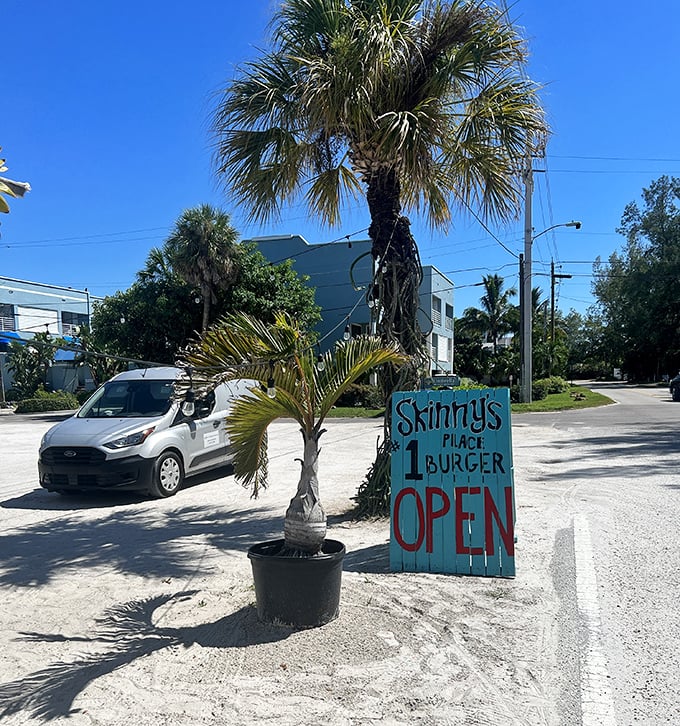 No fancy marketing team needed—just a hand-painted sign, a palm tree, and the promise of Florida's best burger.