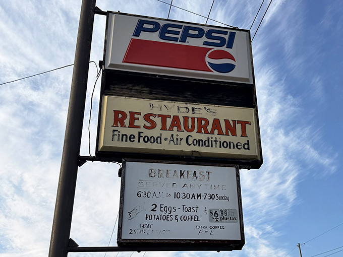 The iconic Hyde's sign against a blue Ohio sky—a landmark that has guided hungry travelers to delicious salvation for decades.