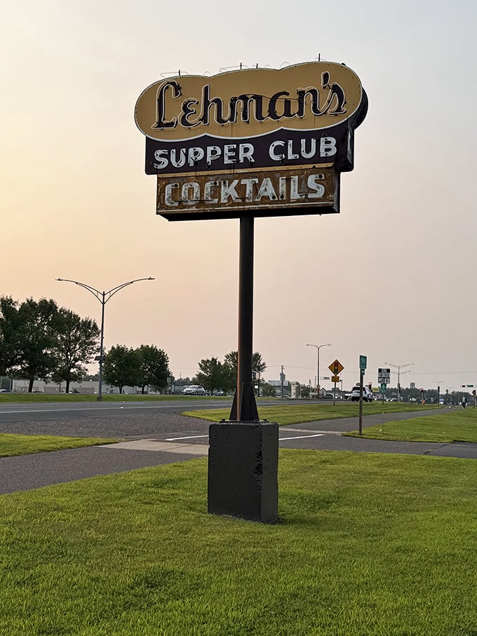 The iconic sign stands tall against the sky – a landmark that's guided hungry travelers to beef paradise since the Roosevelt administration.
