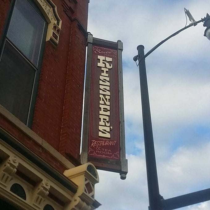 The vertical sign beckons hungry travelers like a lighthouse for the famished—"Kissner's" in bold letters against the Ohio sky.