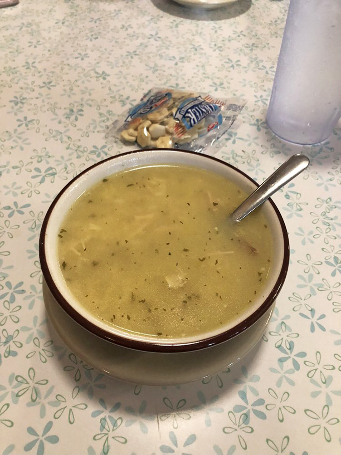 A humble bowl of chicken soup that reminds you of what grandmothers everywhere have always known—sometimes the simplest foods provide the deepest comfort.