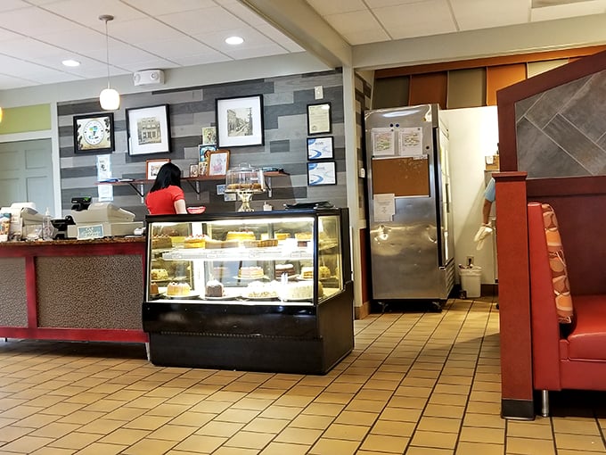 The dessert case—where willpower goes to die and "I'll just have coffee" turns into "Well, maybe just a slice of that chocolate cake."