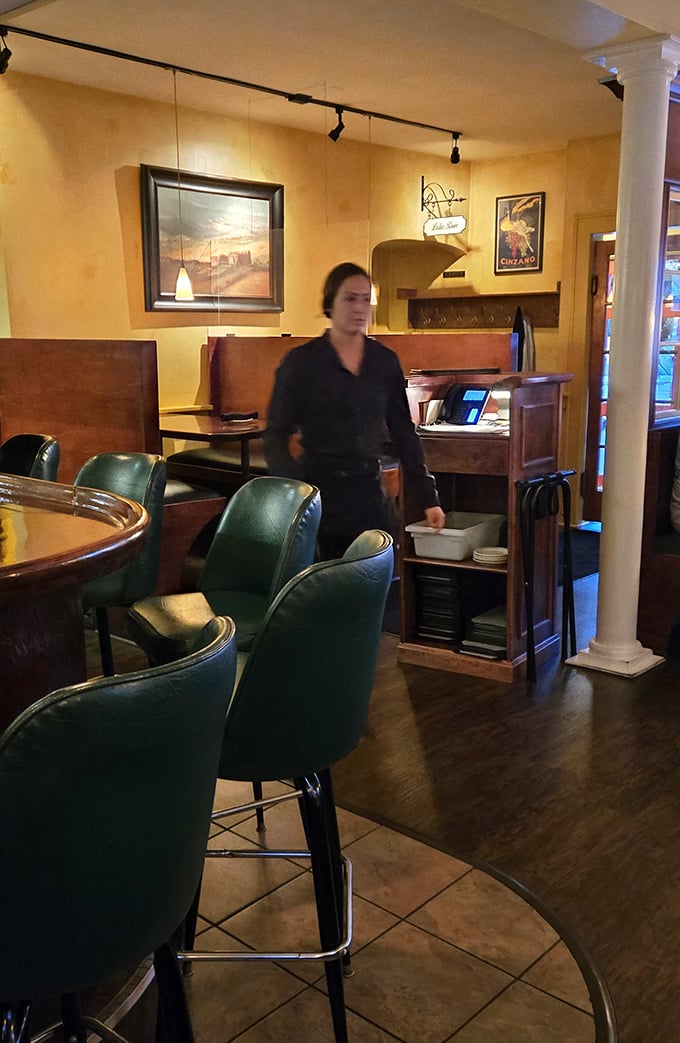 The staff moves with practiced grace through the warm interior. In the restaurant ballet, they're the principal dancers making magic look effortless.