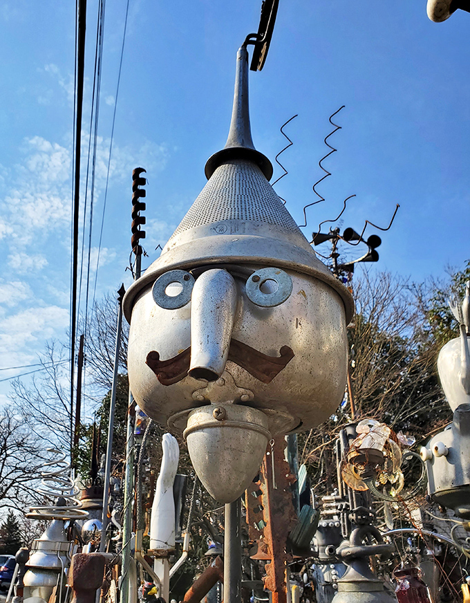 The Tin Man's sophisticated cousin stands guard with a magnificent mustache. Dorothy would definitely take a different yellow brick road to avoid this guy.