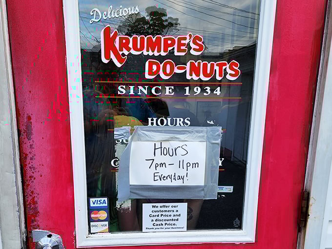 The red door reveals the truth: 7pm-11pm daily. In the donut world, Krumpe's flips the script—midnight snacks become evening treasures.