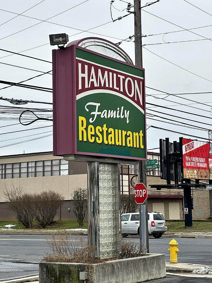 The Ham Fam sign against Pennsylvania sky—a landmark that's directed countless hungry travelers and locals to plates of comfort for decades.