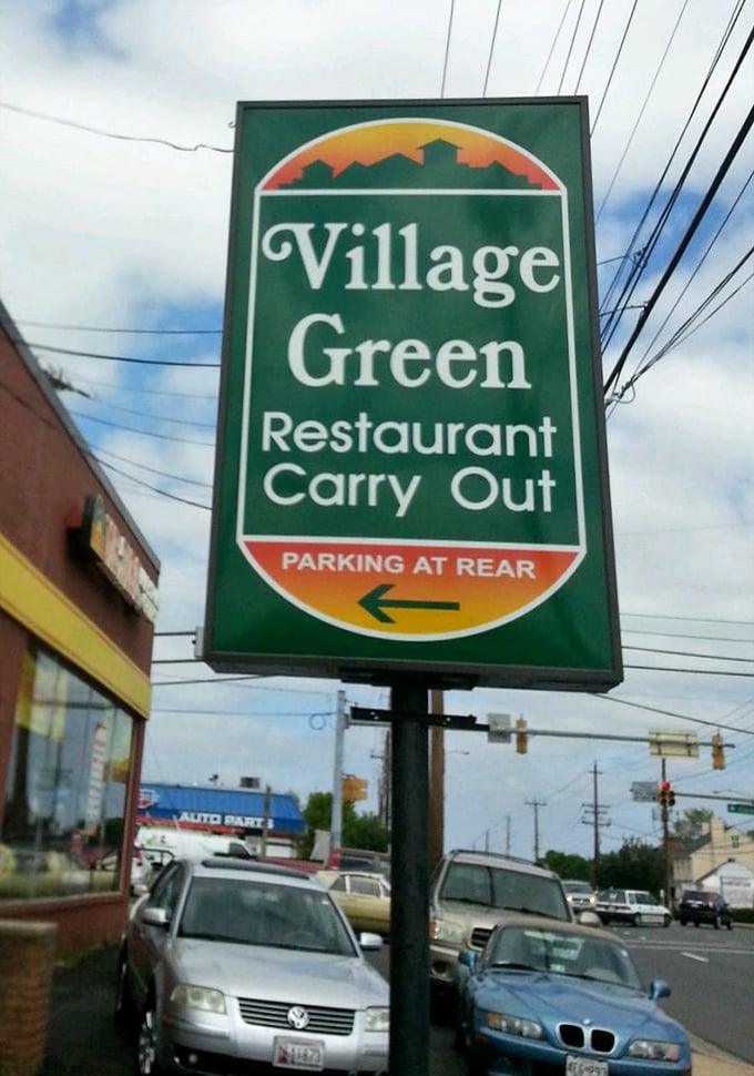 The iconic green sign stands as a beacon for breakfast pilgrims—a North Star for those navigating the universe in search of perfect eggs.