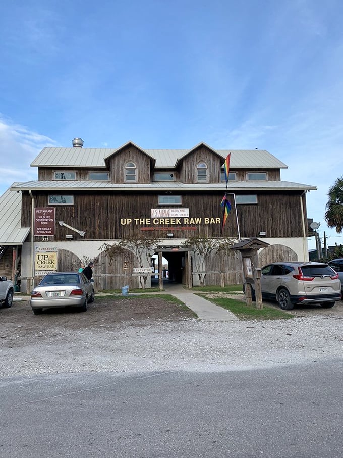 The sun-bleached wooden facade isn't trying to impress anyone – like a well-worn fishing hat, it's earned its character through years of coastal living.
