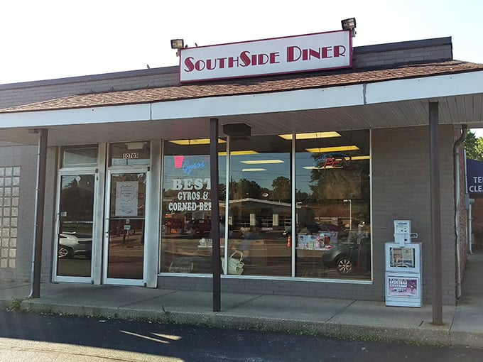 The storefront proudly advertising its gyros and corned beef—a modest exterior that belies the extraordinary breakfast treasures waiting inside.