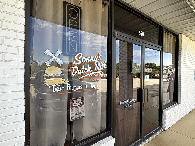 The window proudly proclaims "Best Burgers in Town" - a claim that feels less like marketing and more like a public service announcement.