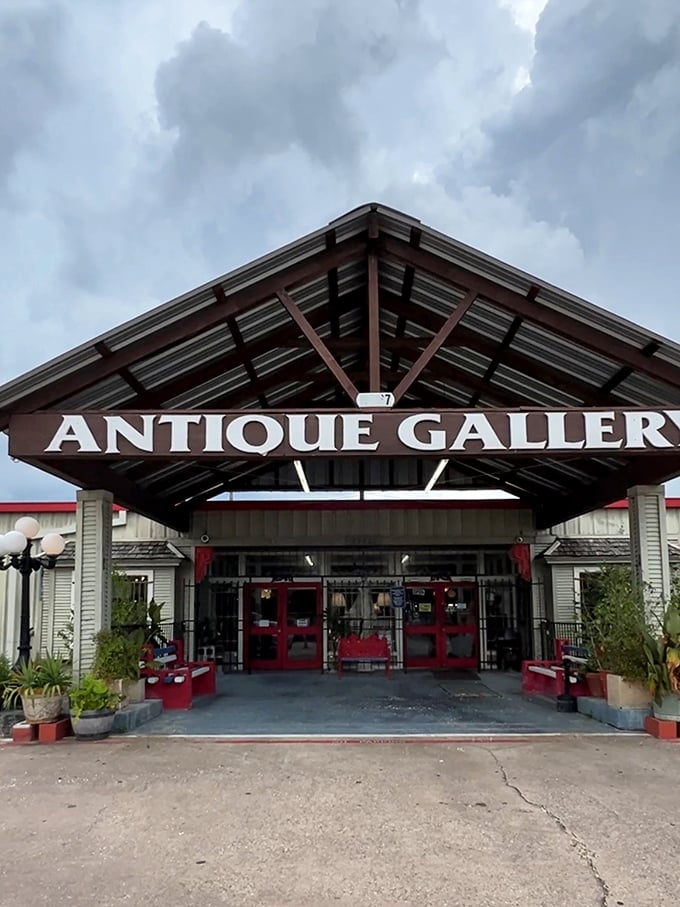 The Antique Gallery's distinctive entrance beckons under moody Texas skies—a portal to treasures waiting to be discovered.