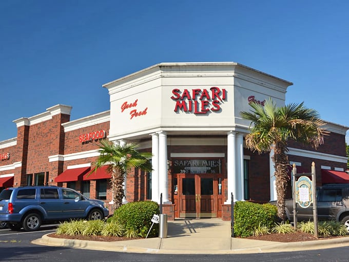 Safari Miles stands proudly on its corner, those signature palm trees like sentinels guarding the gateway to your next favorite meal.