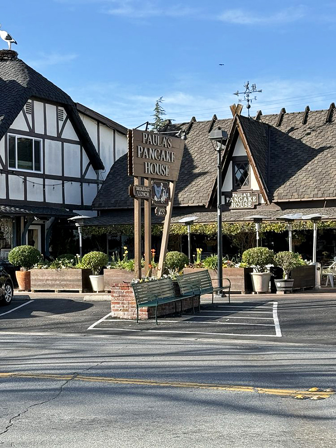 The iconic storefront announces itself with unmistakable Danish-inspired architecture. That weathervane on top isn't just decorative – it's pointing toward pancake paradise.