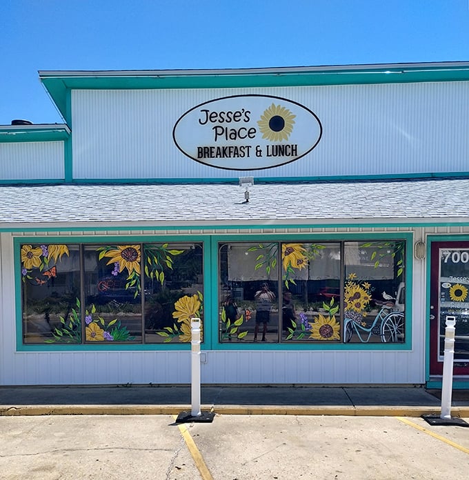 Sunflowers painted on windows beneath a cheery sign—Jesse's Place announces itself with the subtlety of your favorite aunt who brings homemade pie to every gathering.