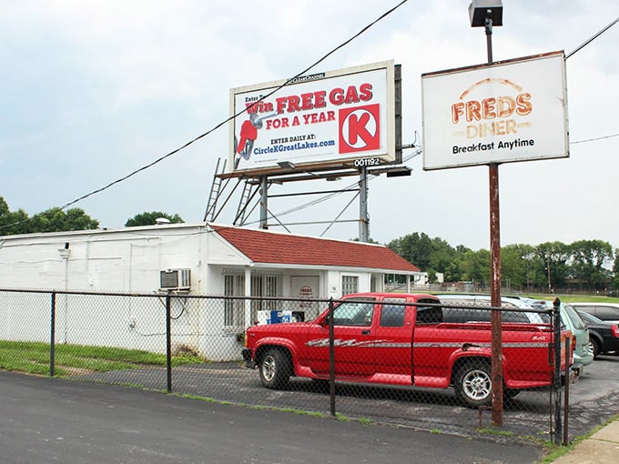 The roadside view of Fred's Diner promises "Breakfast Anytime"—three syllables that might be the most beautiful phrase in the English language.