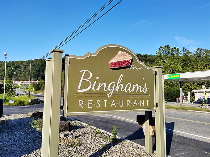 The sign says "Bingham's Restaurant" but might as well read "Your diet ends here" – complete with a slice of pie that's practically winking at you.