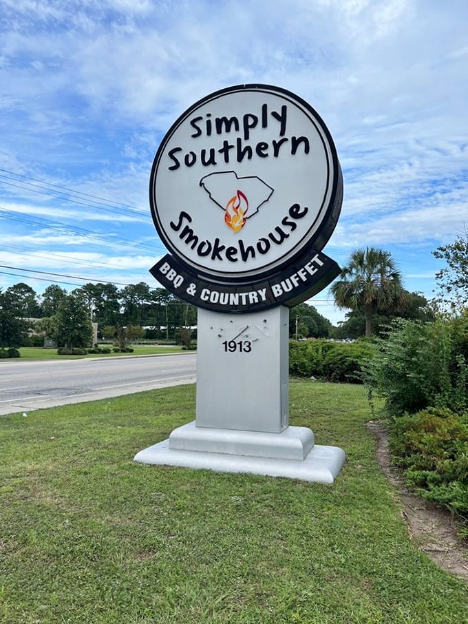 The restaurant's sign proudly displays South Carolina's silhouette with a flame—a beacon for hungry travelers seeking authentic Southern comfort.