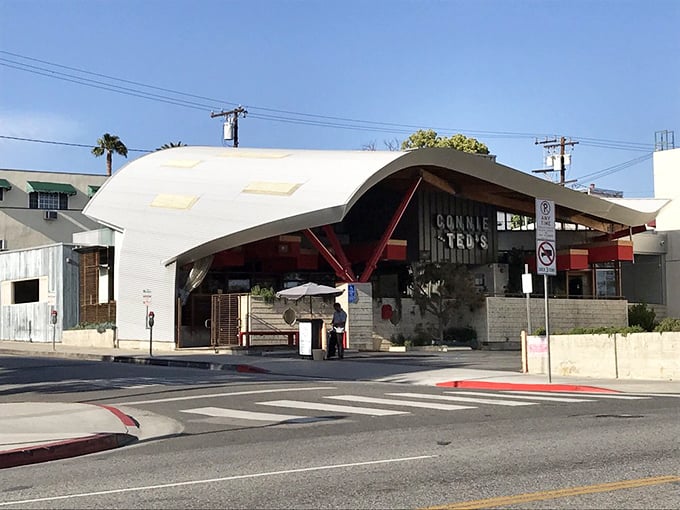 From the street, Connie and Ted's distinctive silhouette stands as a modern landmark on Santa Monica Boulevard—a beacon for seafood lovers across Los Angeles.