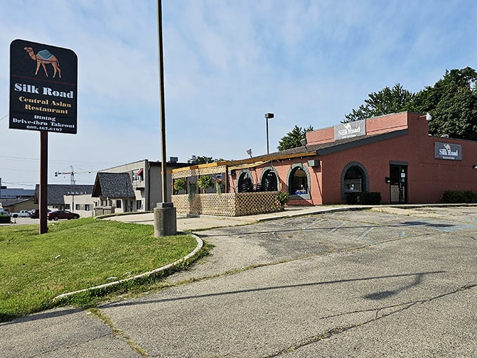 From the street, that distinctive sign and terracotta building beckon like a culinary lighthouse guiding hungry souls to flavor salvation.