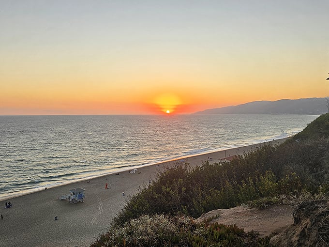 As the sun takes its final bow, the Pacific horizon applauds with color. Malibu sunsets don't need filters—they're already perfect in their natural state.