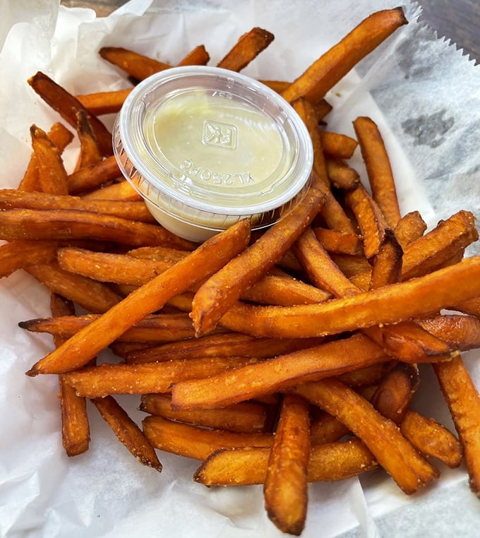 Sweet potato fries with a side of heaven—crispy, sweet, and the perfect companion to anything from the sea.