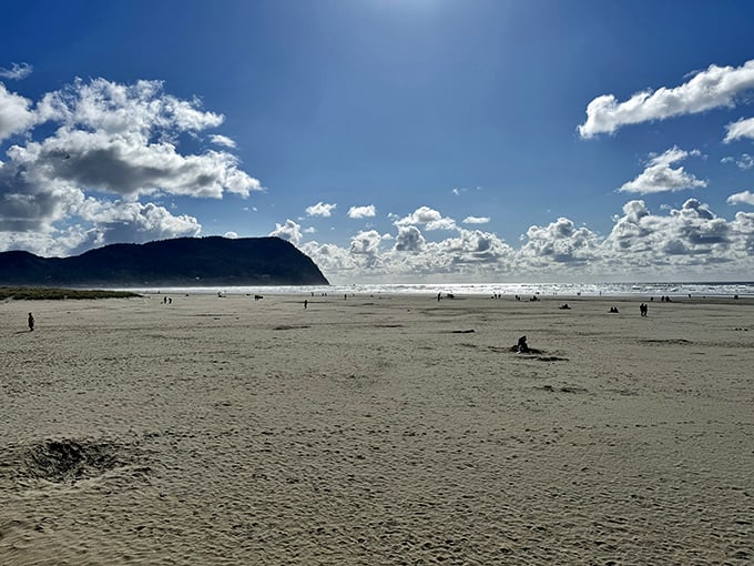 The vast Seaside beach stretches toward the horizon—nature's perfect digestif after a seafood feast that demands a contemplative stroll.