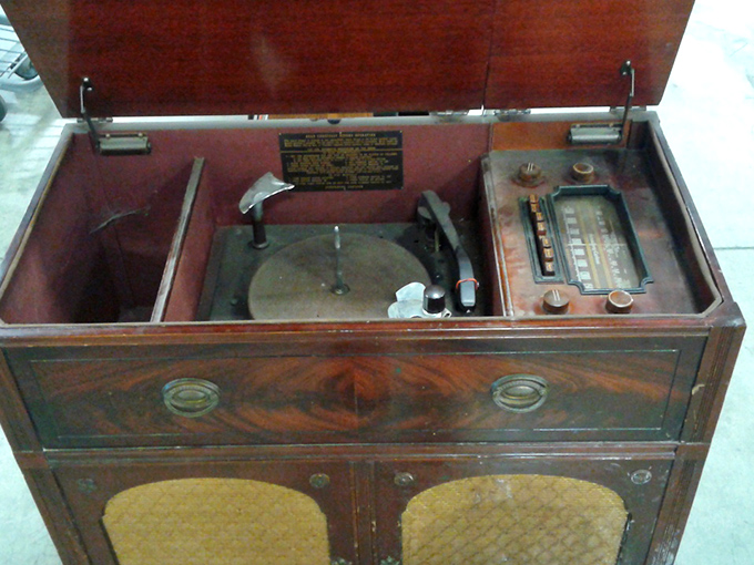 This vintage radio-record player combo isn't just furniture – it's a time machine. Imagine the music and voices that once filled someone's living room through those speakers.