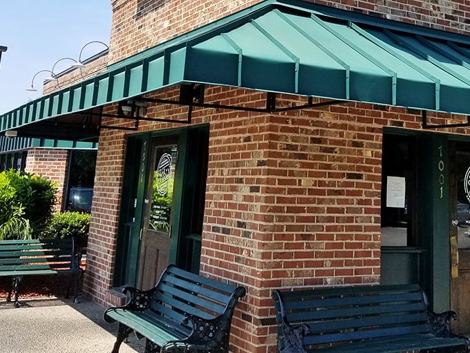 Green benches outside offer a moment to prepare yourself for the flavor journey ahead—or recover from the delicious damage you've just done.