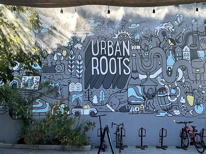 A whimsical mural tells Urban Roots' story in blue hues and playful illustrations – the perfect Instagram backdrop for your meat sweats.