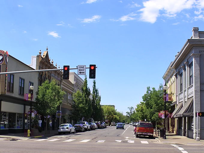 Albany's historic downtown stretches invitingly beneath blue skies, where brick buildings whisper stories of Oregon's past.