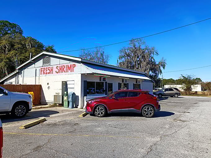 The unassuming white building with "FRESH SHRIMP" says it all. No fancy facade needed when the seafood speaks for itself!