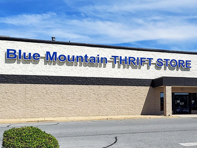 The Blue Mountain Thrift Store's exterior promises treasure hunting adventures behind those unassuming walls. Bargain paradise awaits!