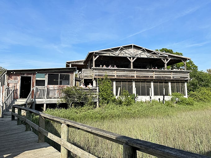 Weathered wood and marsh views create the perfect backdrop for authentic Lowcountry dining adventures.