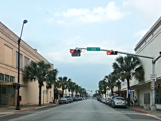 Palm trees line this charming street like nature's own welcome committee in downtown Brownsville.
