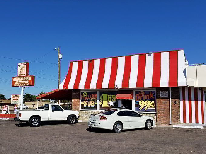 That red and white striped awning screams "submarine sandwiches ahead" louder than a carnival barker.