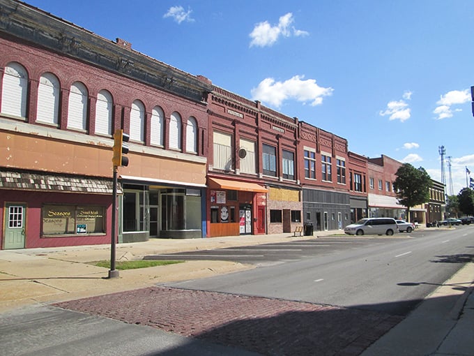 Historic brick storefronts line Coffeyville's main street, where your dollar stretches further than your imagination. Small-town charm with big savings potential.