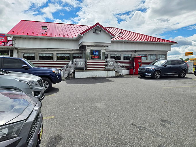 Classic diner architecture meets modern parking - where chrome dreams and comfort food collide beautifully.