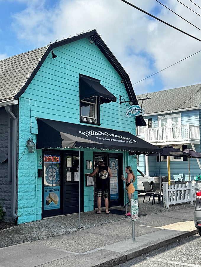 That turquoise facade isn't just Instagram-worthy – it's a beacon calling hungry souls to Italian paradise.