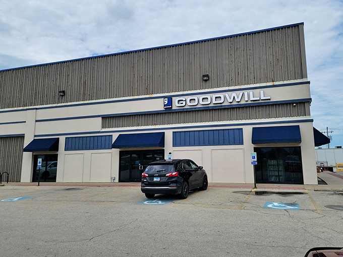 Look at that warehouse-sized treasure chest! This Goodwill's blue awnings promise adventures in bargain hunting.